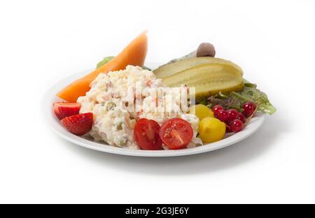 Snack time - View of Russian salad on a white plate Stock Photo - Alamy