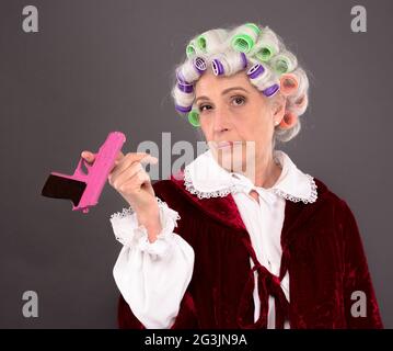 Grandmother with gun Stock Photo - Alamy