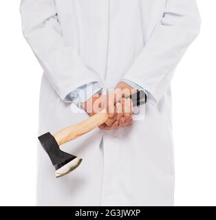 Evil medic holding a small axe and stethoscope Stock Photo - Alamy