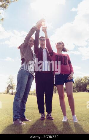 Best friends resting in park Stock Photo - Alamy