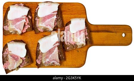 Snack for vodka, homemade salo with bread and horseradish Stock Photo ...