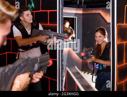 Laser tag players playing in teams Stock Photo - Alamy