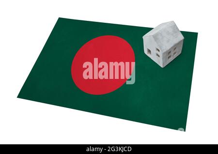 Small house on a flag - Bangladesh Stock Photo - Alamy
