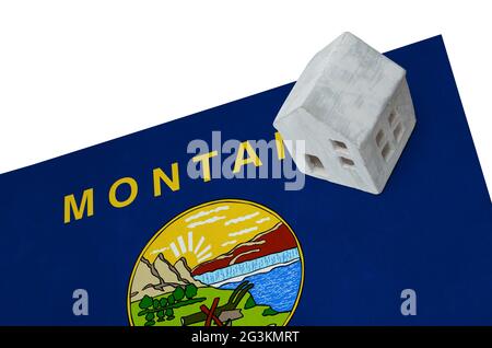 Small house on a flag - Montana Stock Photo - Alamy