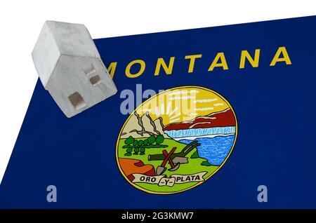 Small house on a flag - Montana Stock Photo - Alamy