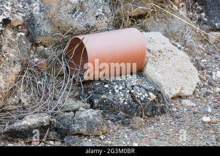 Pollution in Greece - Plastic pipe left in nature Stock Photo - Alamy