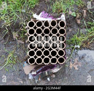 Used fireworks on te street Stock Photo - Alamy