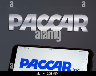 In this photo illustration, PACCAR Inc. logo seen displayed on a ...