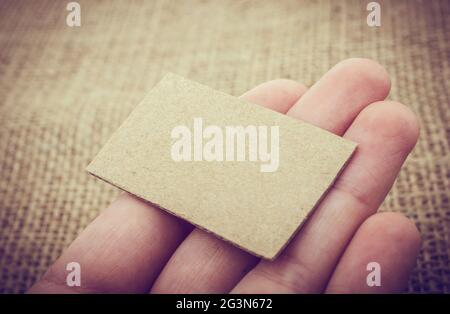 Little note paper on a linen canvas Stock Photo - Alamy