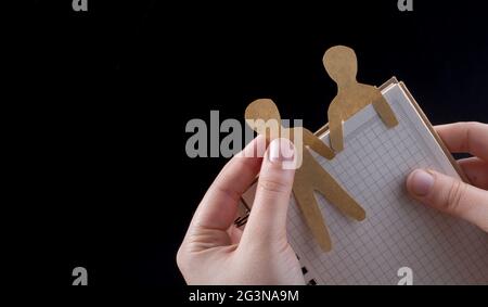 Man shape cut out of paper in the view Stock Photo - Alamy