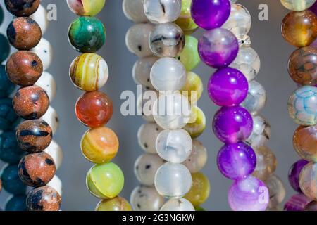 Beautiful colorful beads of various type and color Stock Photo - Alamy