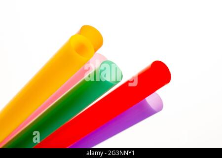 Different color of straw on a white background Stock Photo - Alamy