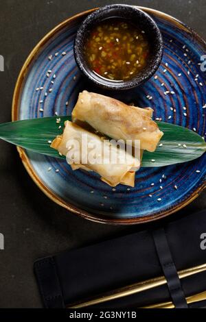 Fried pancakes stuffed with beef served with sauce Stock Photo - Alamy