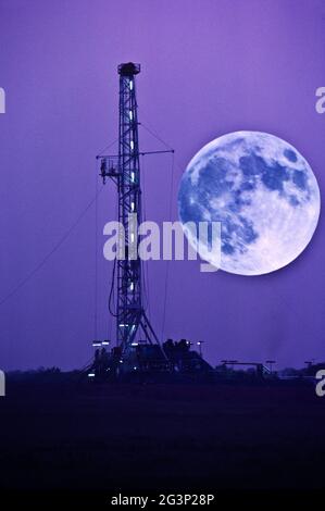 Oil rig and moon Stock Photo - Alamy