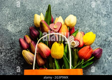 St. Valentine card concept with heart shaped decor on wooden background ...