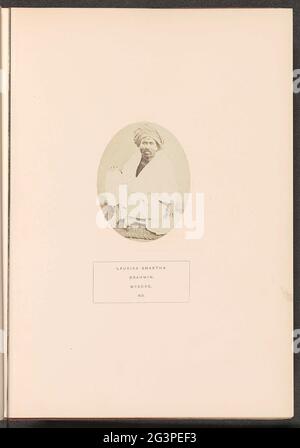 Portrait of an unknown Smarta from Mysore behind a low writing table, c ...