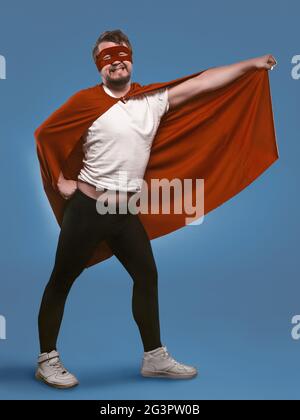 Businessman in a red superhero cloak Stock Photo - Alamy