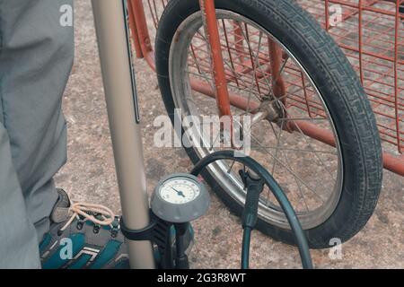 Pumping air into carriage wheel. The air pumping system in the wheel ...