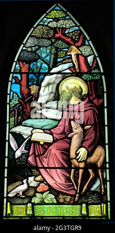 A stained glass window by Alex Booker depicting Saint Giles with his ...