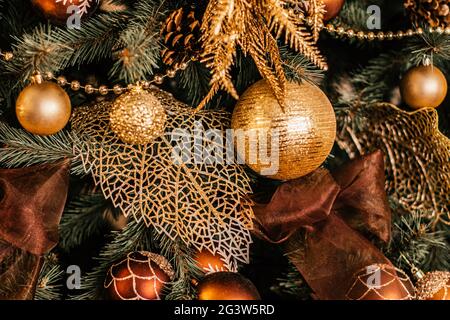 Golden Christmas tree look, decor in country style as holiday home ...