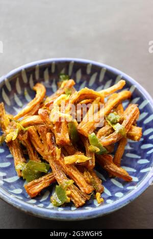 Dry Bombay duck fried with chili and garlic. Dried Bombay duck masala ...