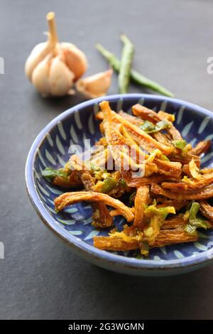 Dry Bombay duck fried with chili and garlic. Dried Bombay duck masala ...