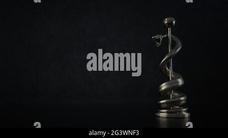Snake Staff Of Asclepius Stock Photo - Alamy
