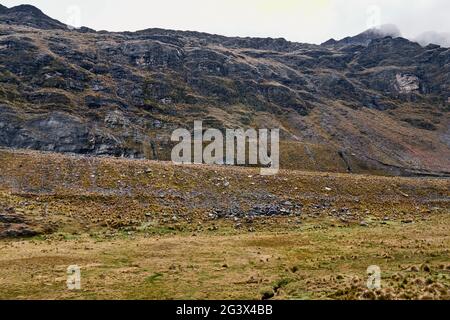 View of arid mountains, wonderful cloudy landscape with dry grasses in ...