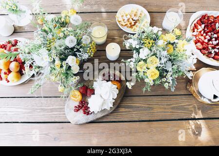 Appetizing breakfast on table on terrace Stock Photo - Alamy