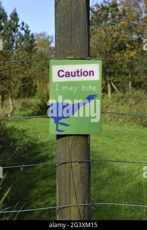 A warning sign that these animals may bite Stock Photo - Alamy