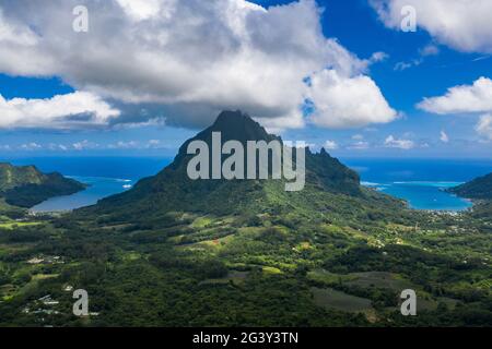 Aerial view of Cooks Bay and mountains on Island of Moorea swimming ...