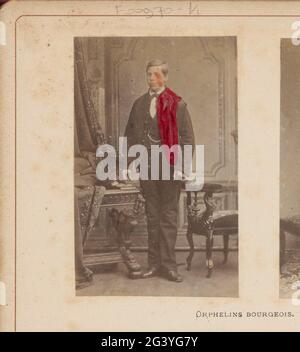 Portrait of a boy in the uniform of the Burgerweeshuis in Amsterdam, c ...