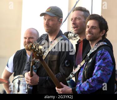 Will Champion (L) and Chris Martin of Coldplay perform in concert at ...