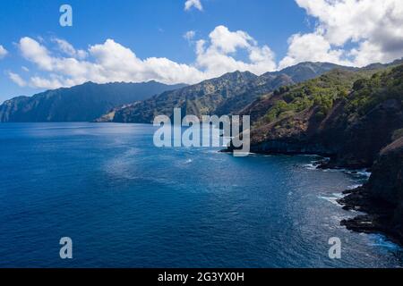 Aerial view of mountain and coast, Omoa, Fatu Hiva, Marquesas Islands ...