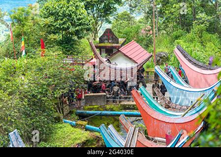 Procession to the Lo'ko Mata rock tombs high up in the mountains of ...