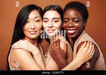 young pretty caucasian, afro, asian, scandinavian woman posing cheerful ...
