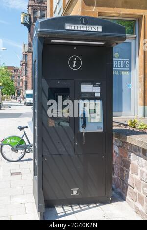 A black telephone box in the City Of Westminster London Stock Photo - Alamy