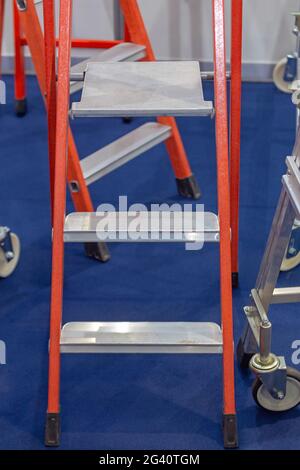 Metal Step Ladder in Storage Room Warehouse Stock Photo - Alamy