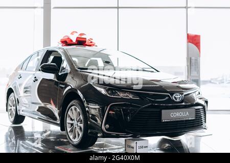 Kyiv, Ukraine - 09 Feb, 2021: Toyota car in the showroom. Toyota car ...