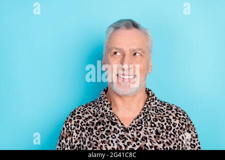 Photo of old dreamy curious grandfather look empty space wear red vest ...