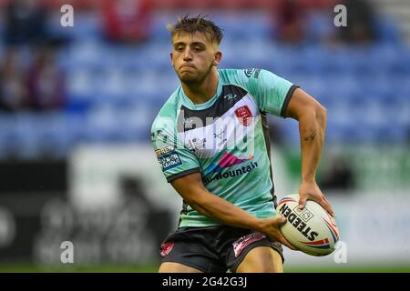 Mikey Lewis (20) of Hull KR puts a high kick in the air Stock Photo - Alamy