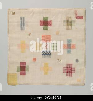 Handmade embroidery. Multicolored patterns on white fabric. Ethnic ...