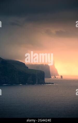 Risin og Kellingin rock formations on the coast of Eysturoy Island ...