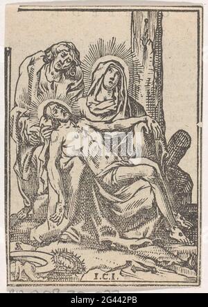 Pieta. Maria mapping at the foot of the cross with the body of the Died Christ in her lap. In ...