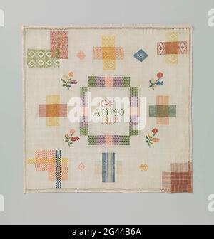 Handmade embroidery. Multicolored patterns on white fabric. Ethnic ...