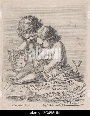 Two Boys Draw in a Sketchbook at a picnic Table in the woods Stock ...