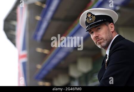 A member of the military looks towards the parade ring during day five ...