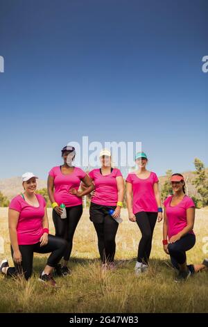 Sports women group, grass and bottle in circle for toast, celebration ...