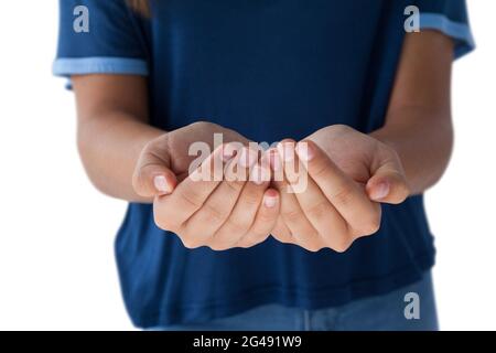 Girl with hand cupped against white background Stock Photo - Alamy