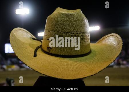 Reno, United States. 18th June, 2021. Bull rider Cole Fischer gets ...
